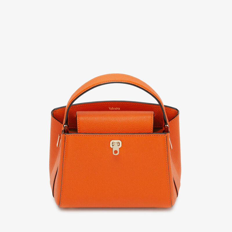 Embossed leather bags, custom backpacks, monogram purses | Valextra