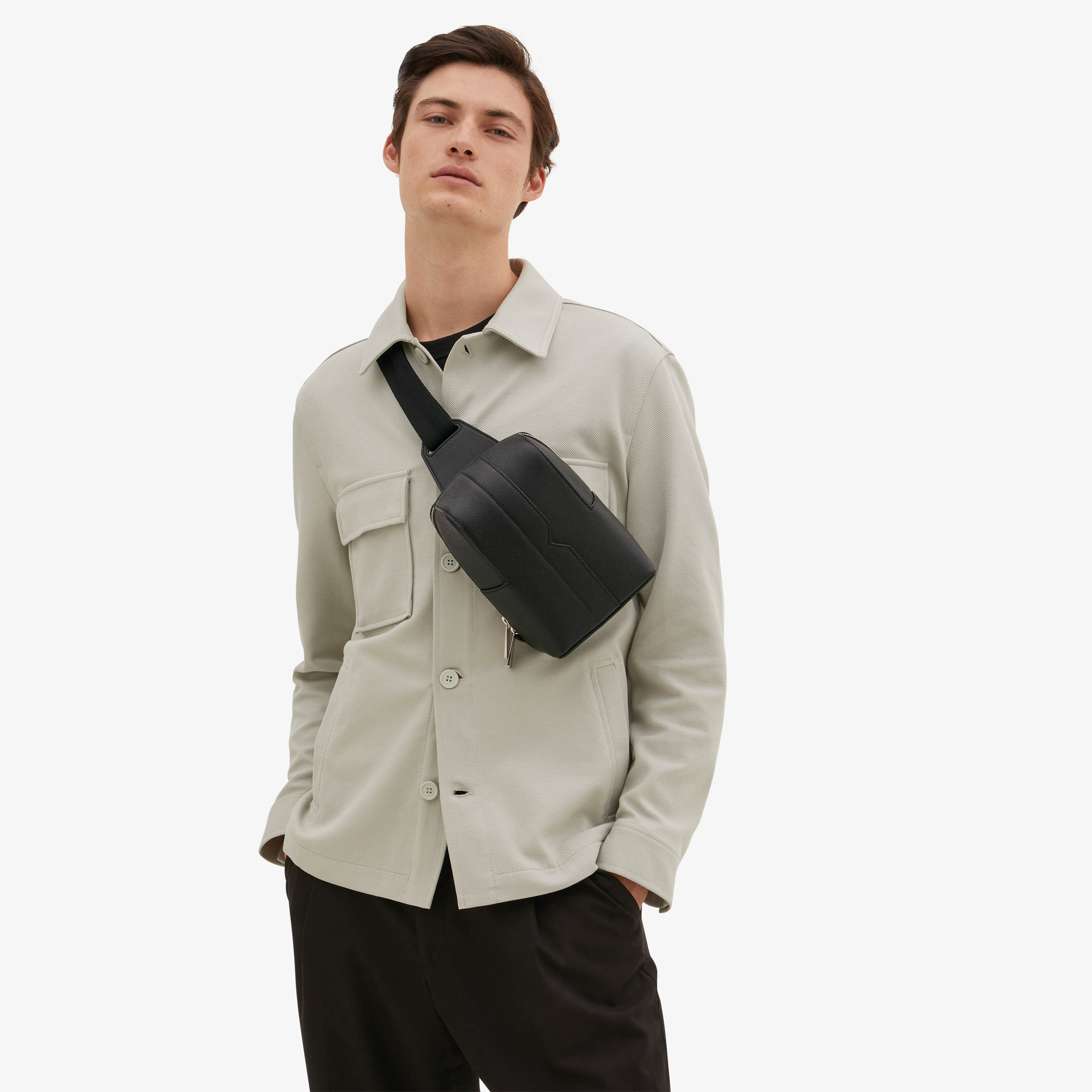 Black Leather one shoulder Mini backpack | Valextra V-Line